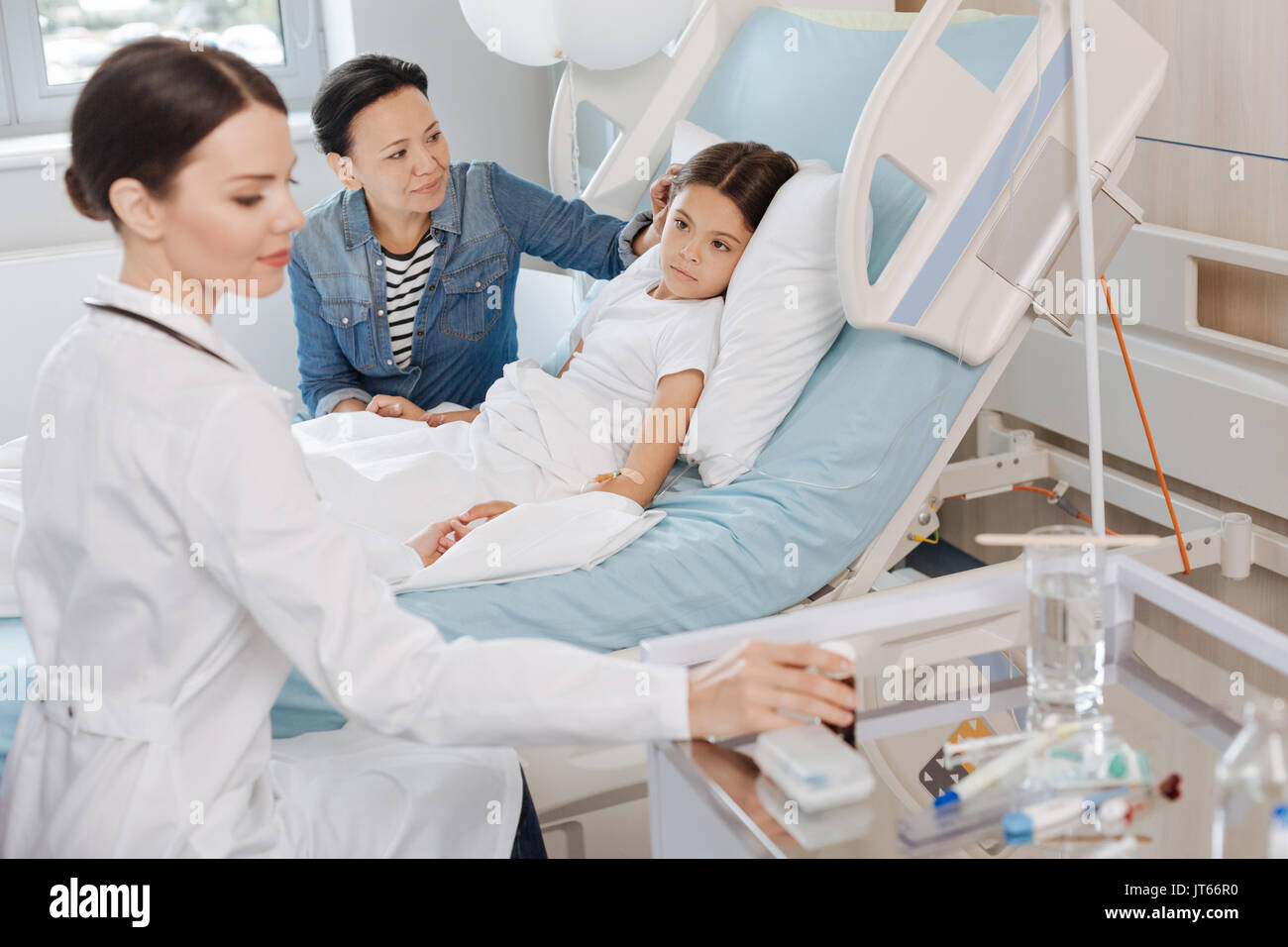 Nice cheerless girl having a serious disease Stock Photo - Alamy