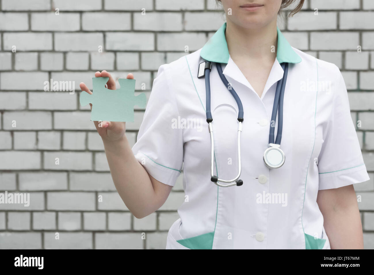 Medicine concept doctor. On a white brick wall background. system ...