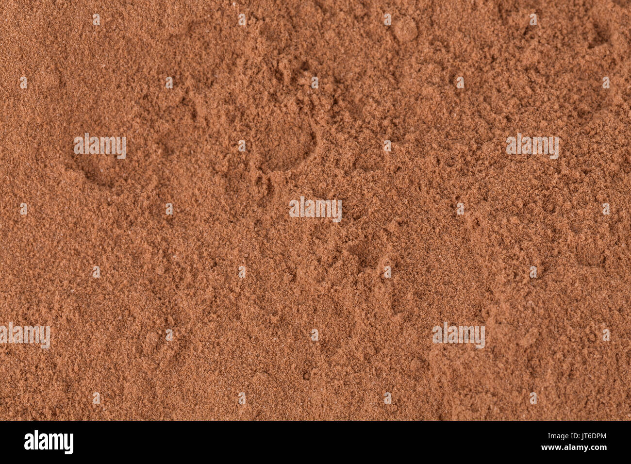 Top view on cocoa powder closeup background Stock Photo - Alamy