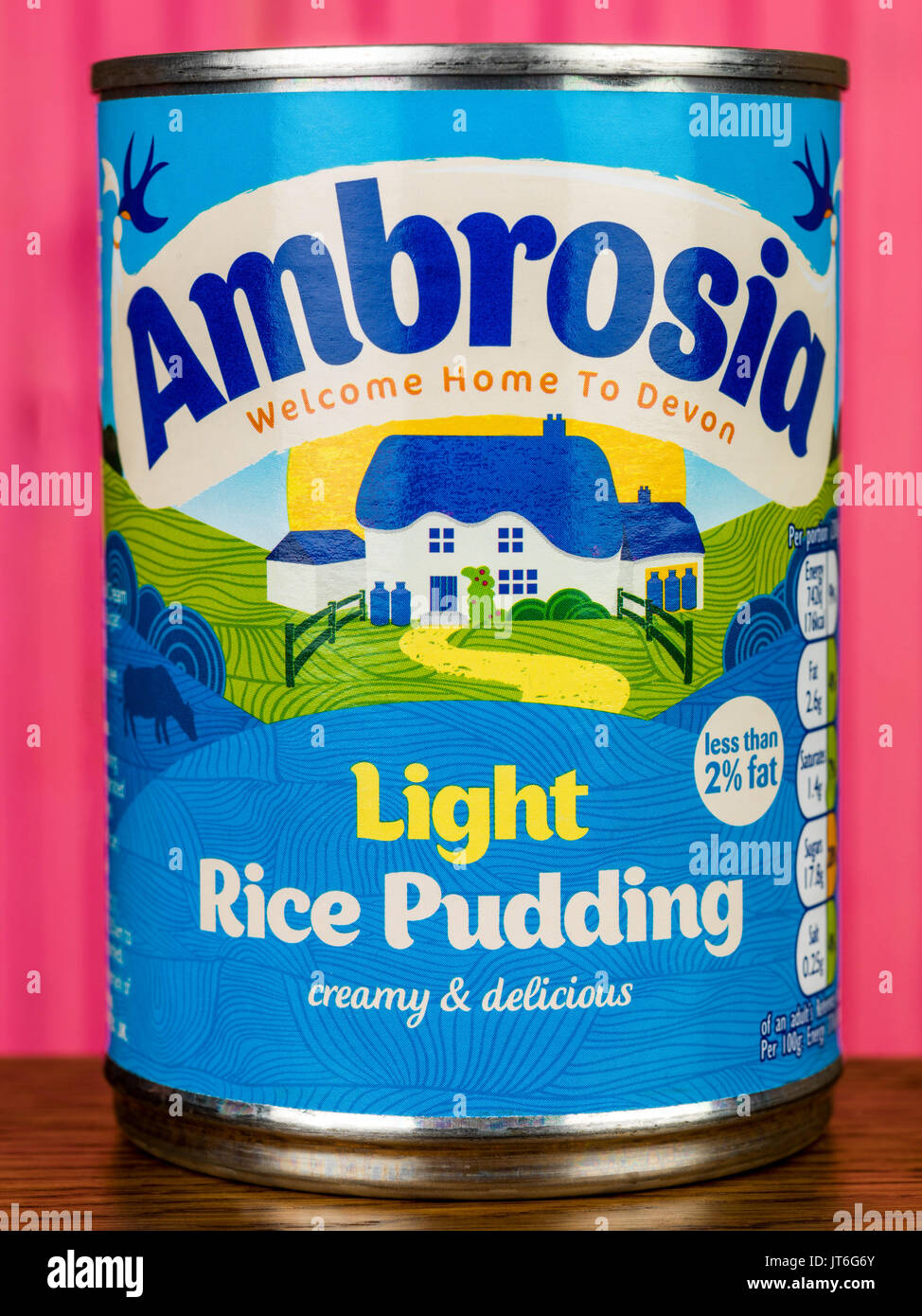 Can or Tin of Ambrosia Light Rice Pudding Agaqinst a Pink Wooden ...