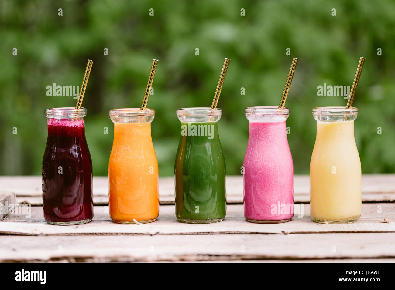 Fresh colorful smoothies -outdoors Stock Photo - Alamy
