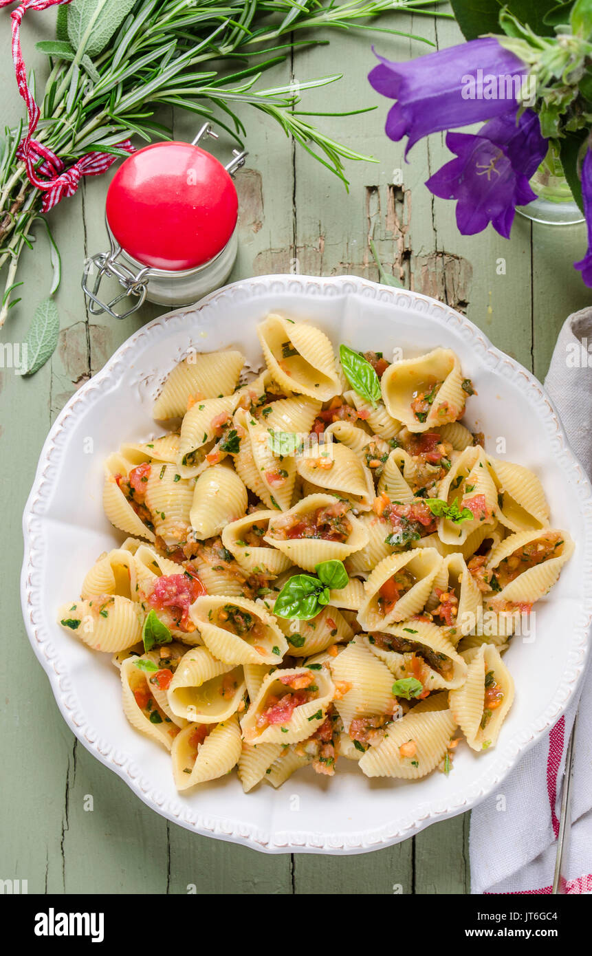 Pasta shells with raw vegetable sauce Stock Photo - Alamy