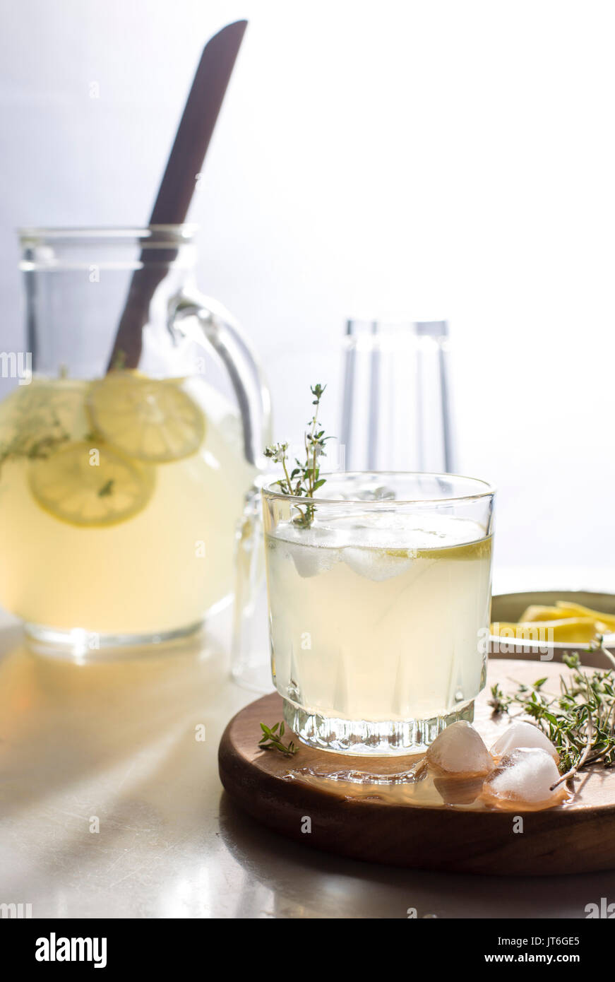 Thyme lemonade in a glass pitcher Stock Photo - Alamy