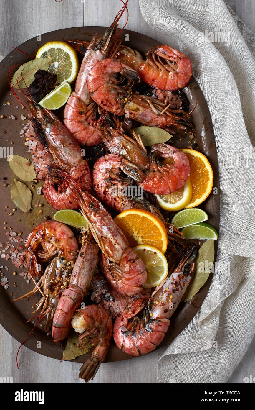 Cooked red shrimp on a light background Stock Photo - Alamy