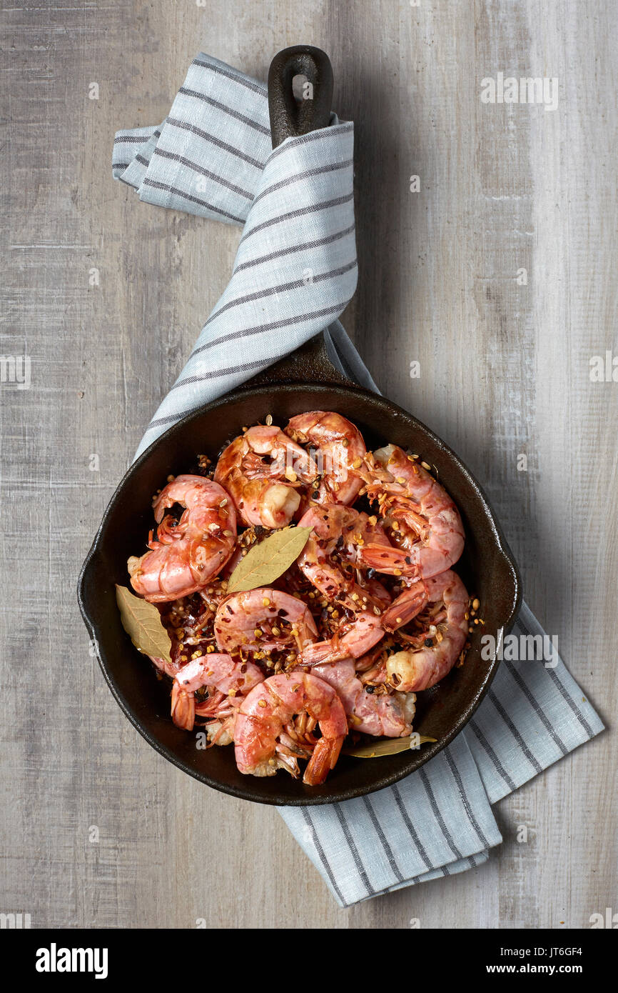 Cooked red shrimp on a light background. Prepared in a frying pan Stock ...
