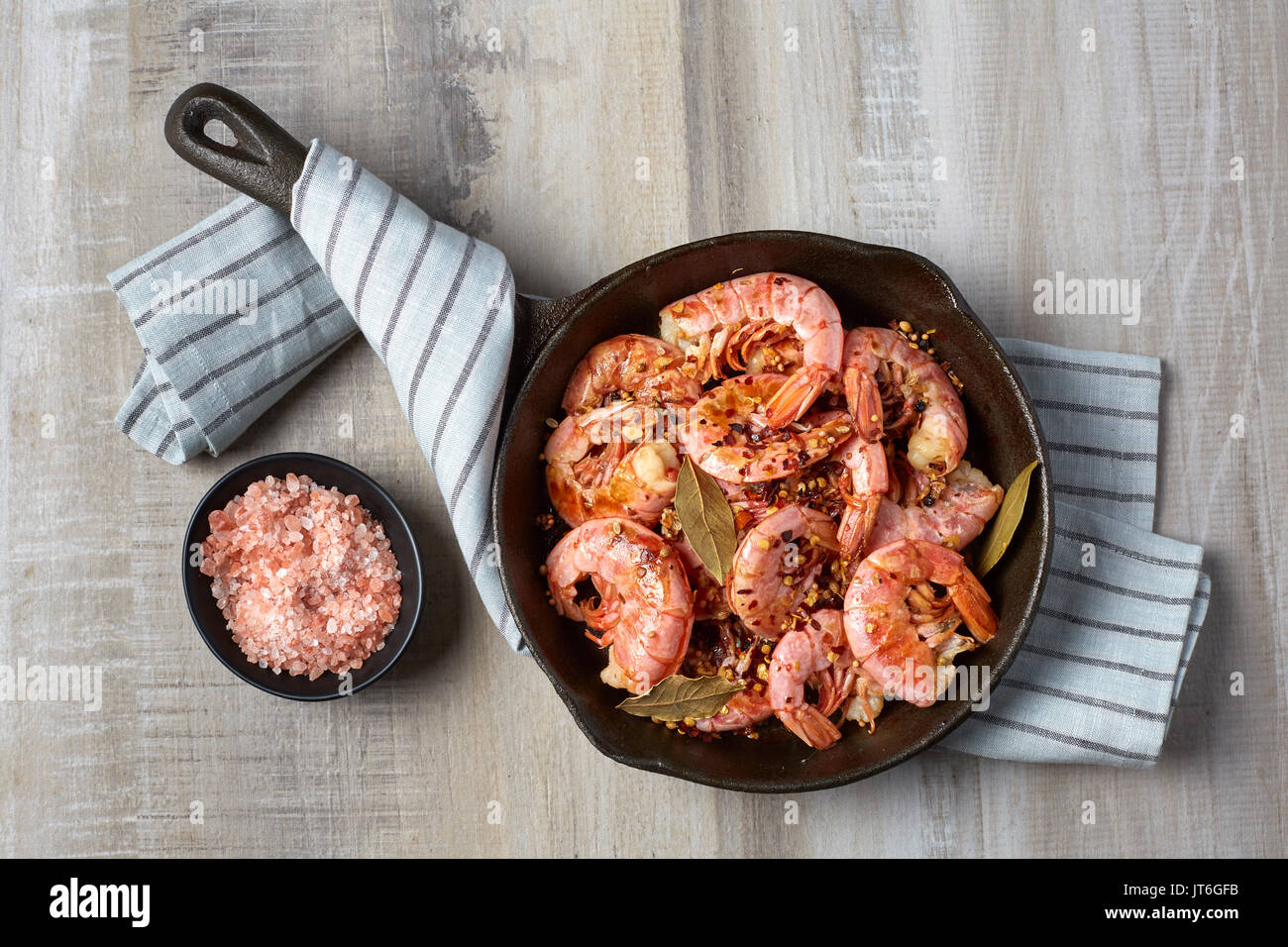 Cooked red shrimp on a light background. Prepared in a frying pan Stock ...