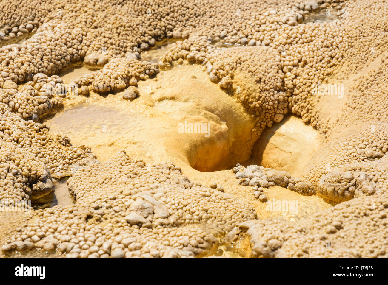 Yellow soil of hot springs, geysers. Mineral deposits. Alien planet ...
