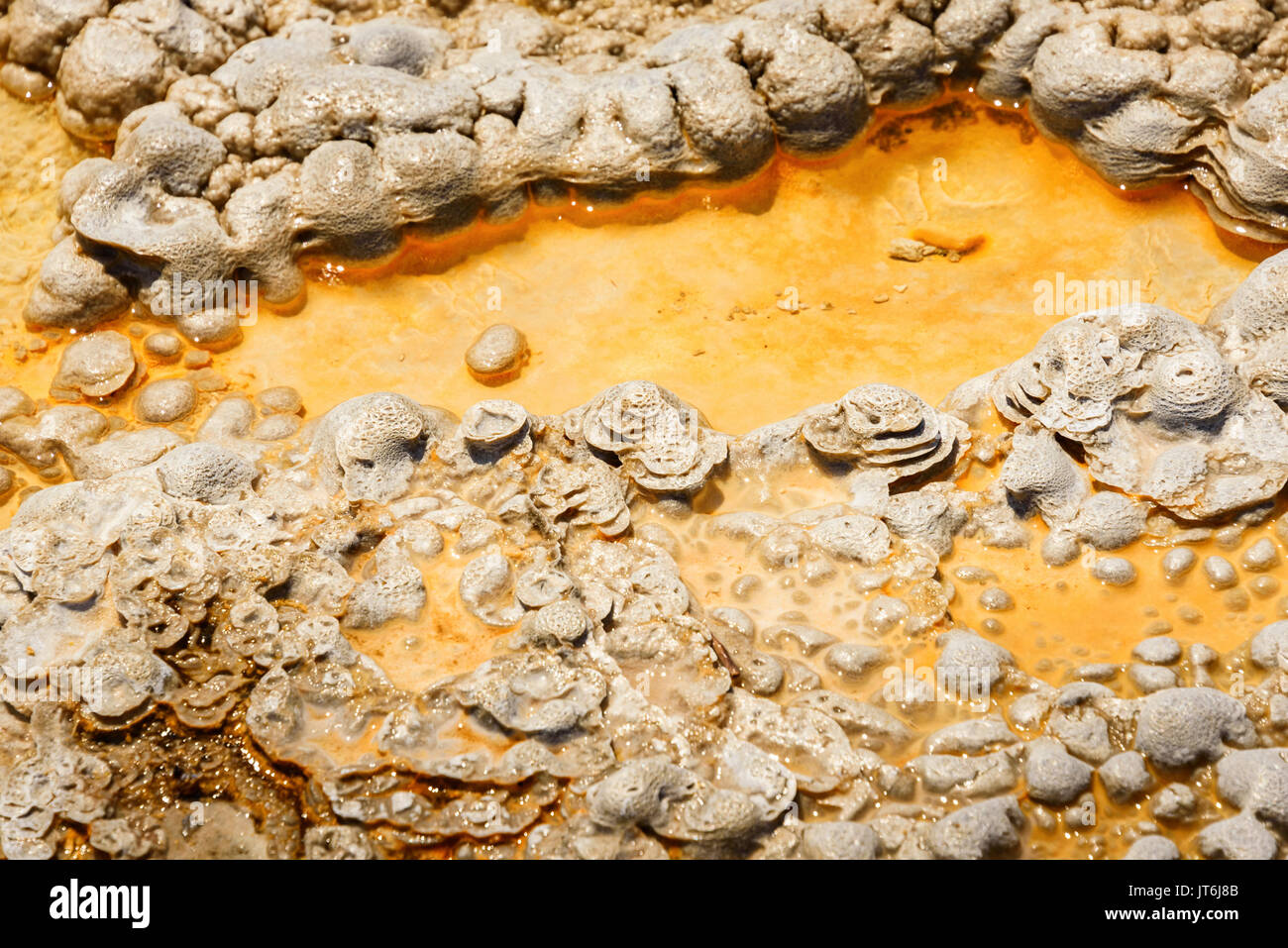 Colorful soil of hot springs, geysers. Mineral deposits. Alien planet ...