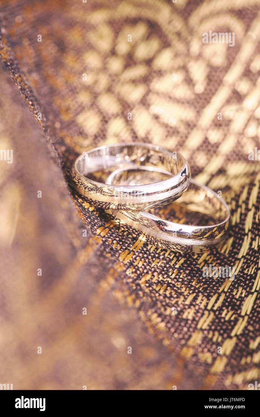 Wedding rings on beautiful background Stock Photo - Alamy