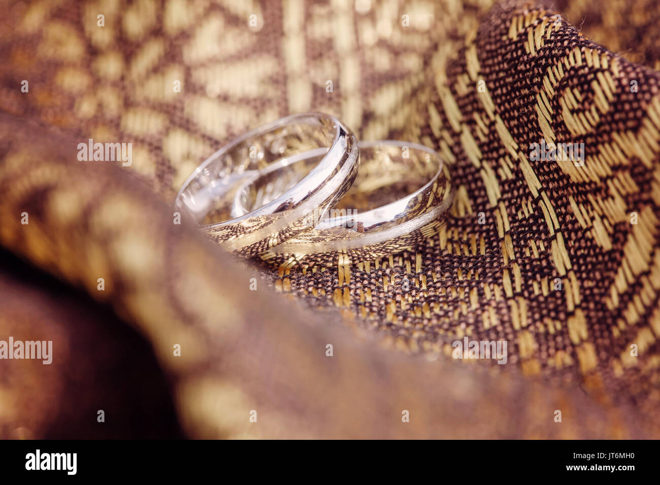 Wedding rings on beautiful background Stock Photo - Alamy
