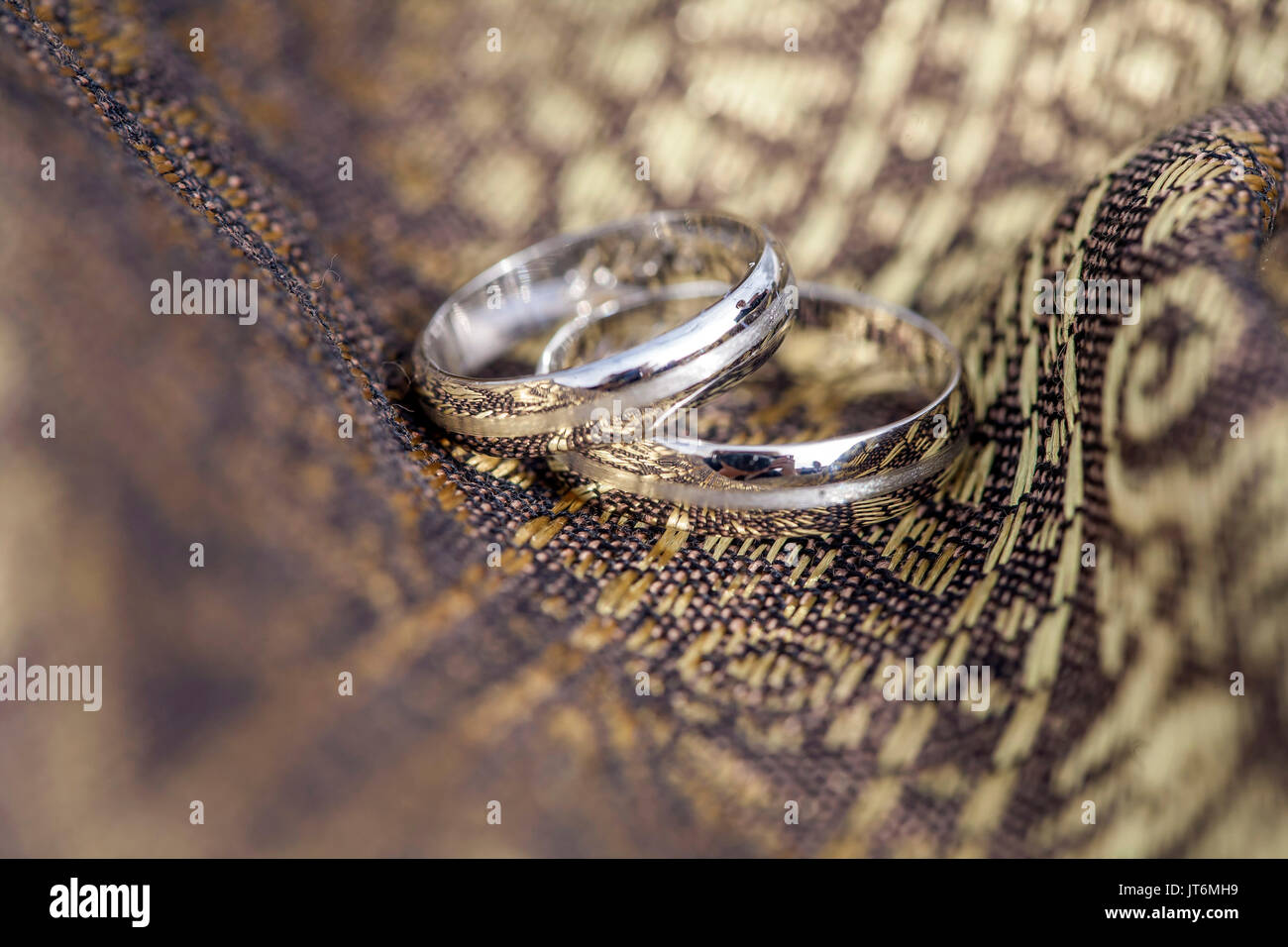 Wedding rings on beautiful background Stock Photo - Alamy