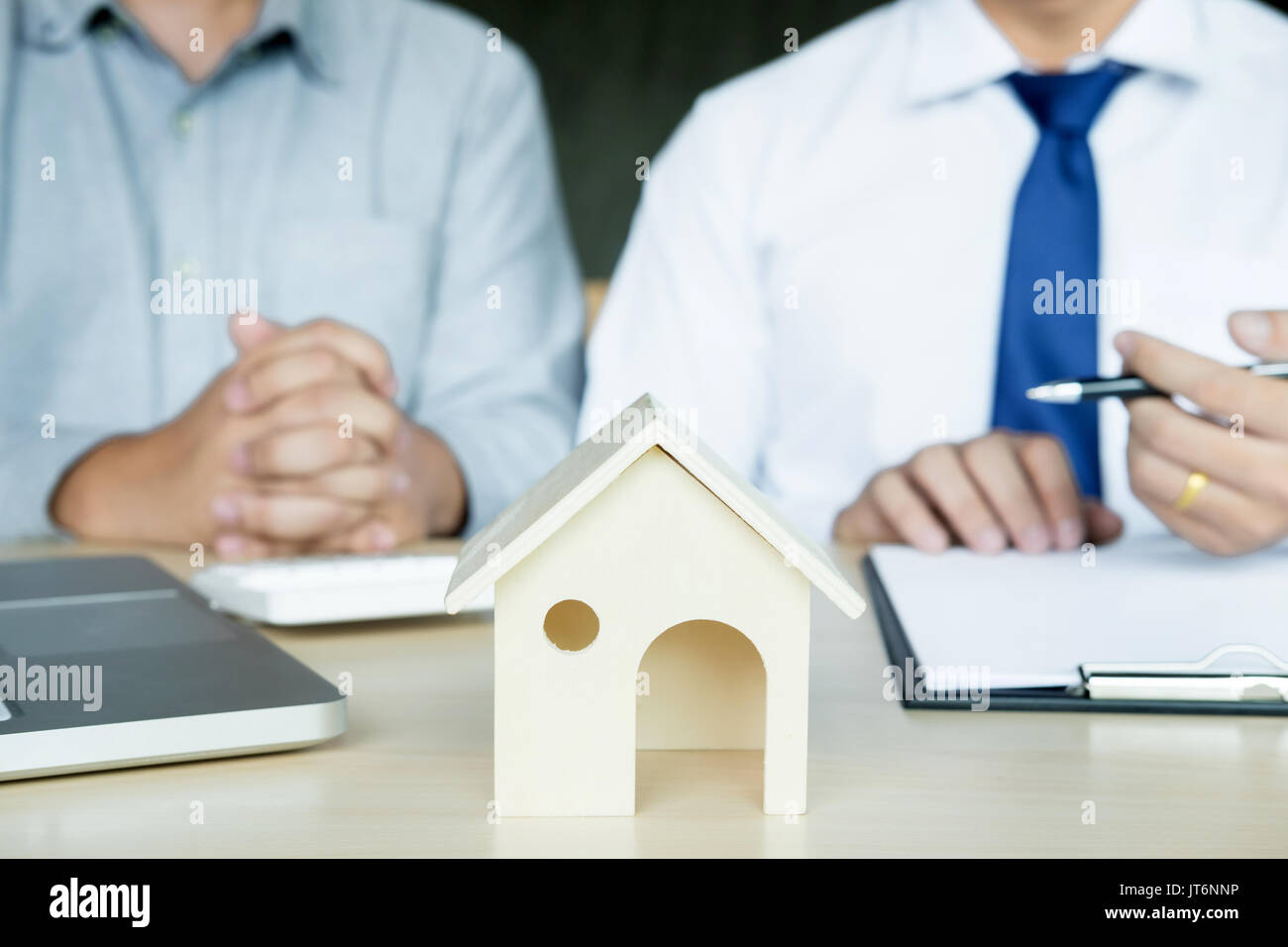 Real estate agent to present the property (house) to customer Stock ...