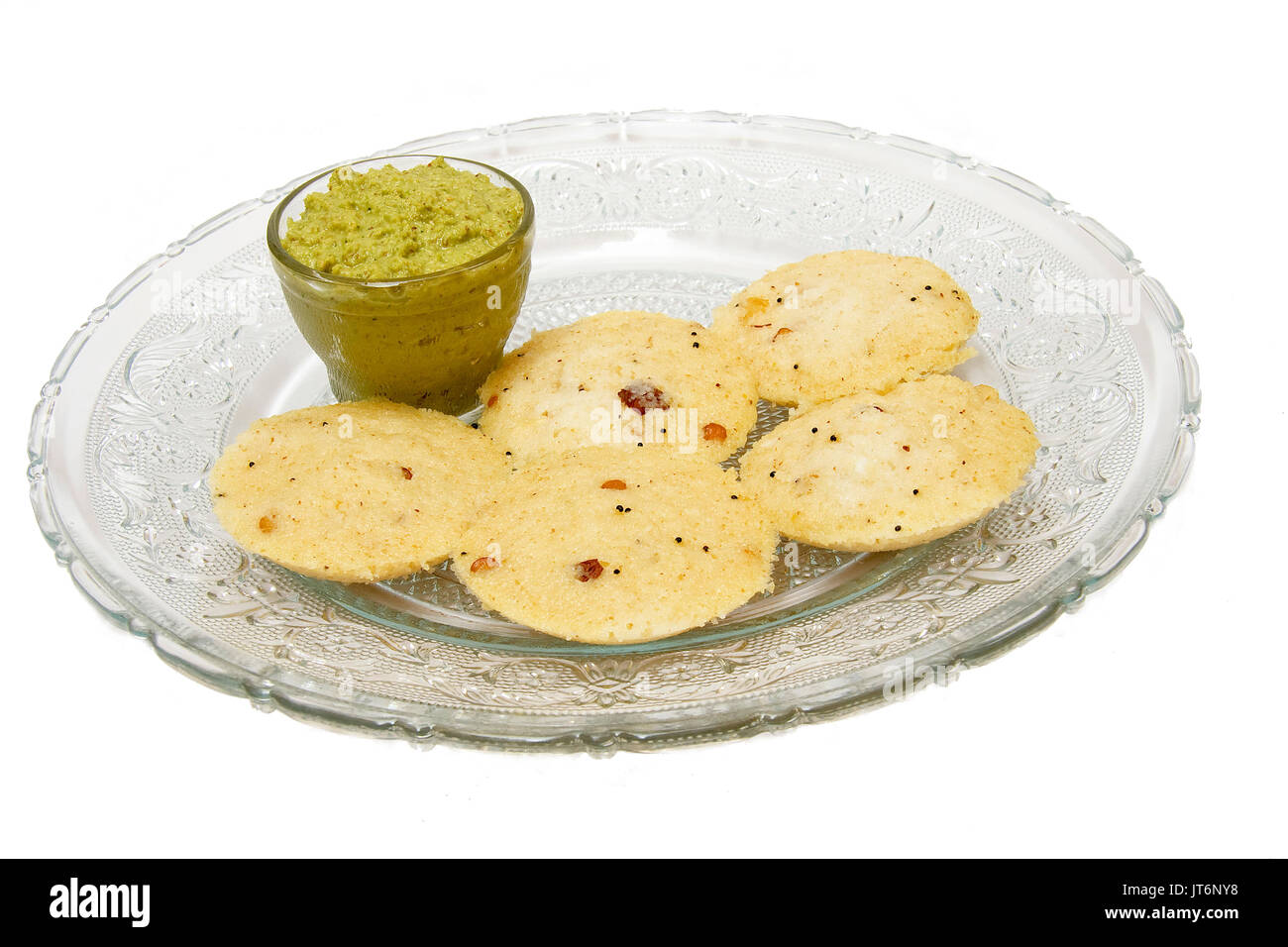 Dish of delicious, mouth-watering "Rice Rave Idli" and coconut "Chatni ...