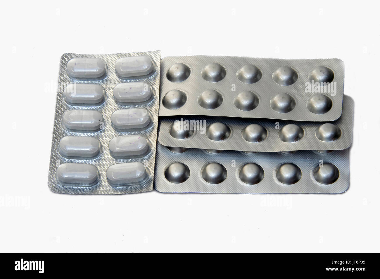 Strips of medicine tablets bubble packed in aluminum foils Stock Photo ...