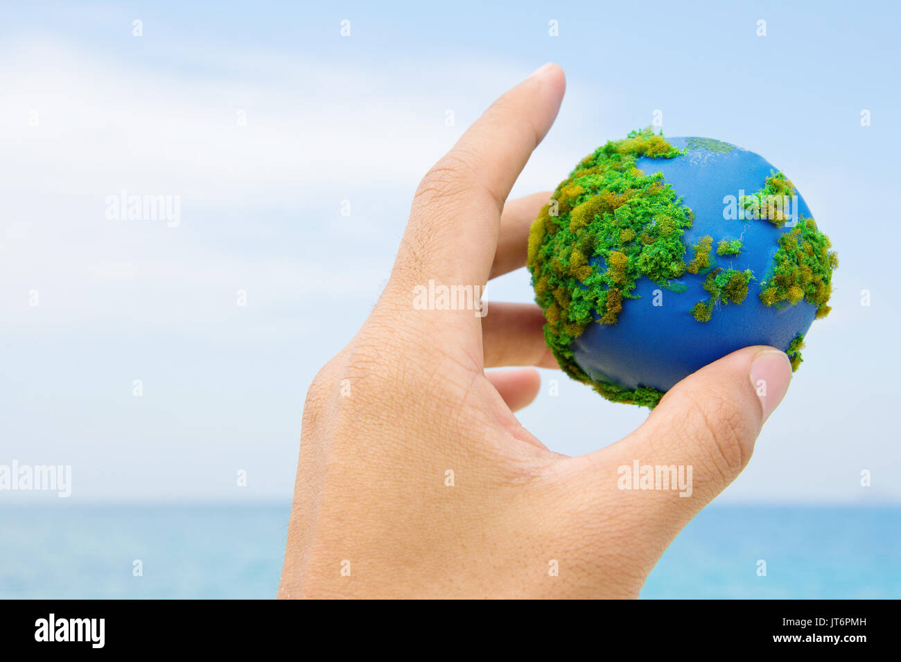 Hands and Earth Concept Save green planet Stock Photo - Alamy