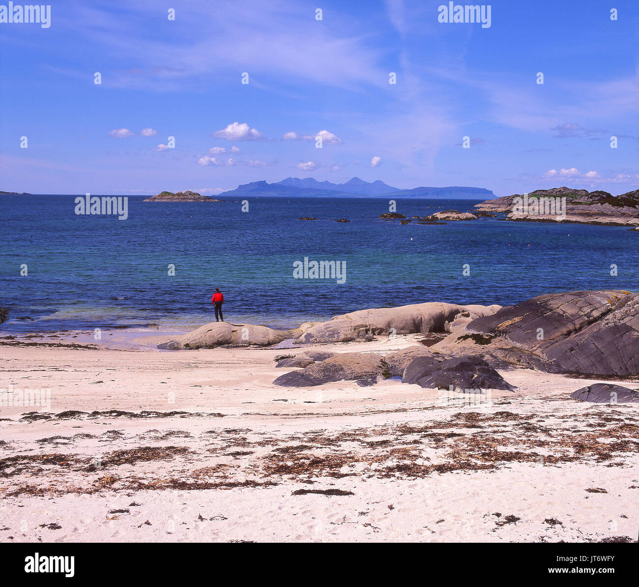 A beautiful summer view towards the islands of Eigg and Rhum from ...