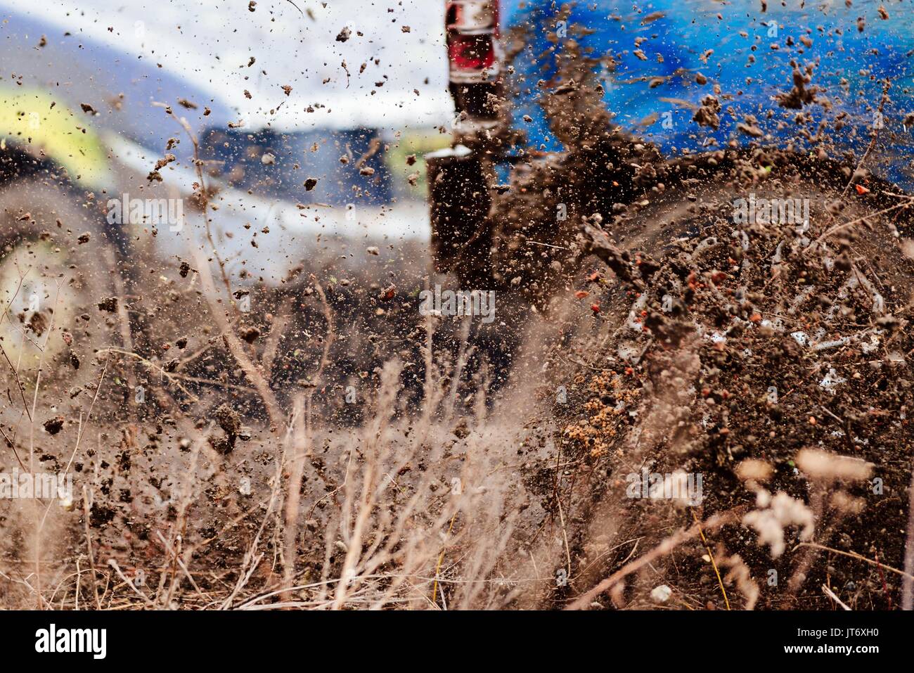 Wreck scrap cars dirt race. Selective focus on splashing mud Stock ...