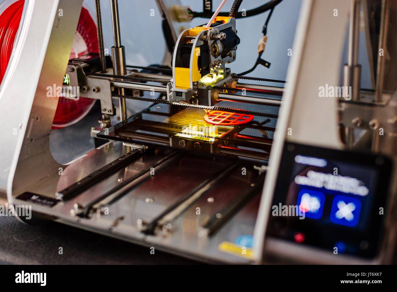 3d printer working and printing plastic prototype Stock Photo - Alamy
