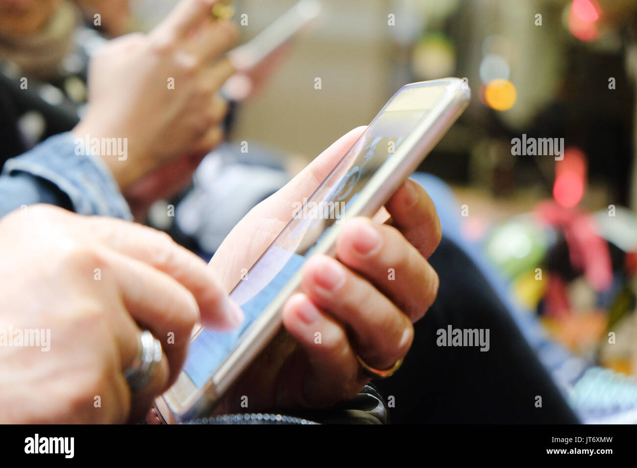 Group of people using mobile devices Stock Photo - Alamy