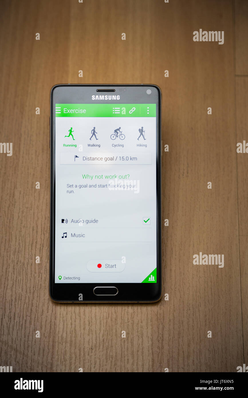 London, UK. Samsung smartphone running exercise tracking app Stock ...
