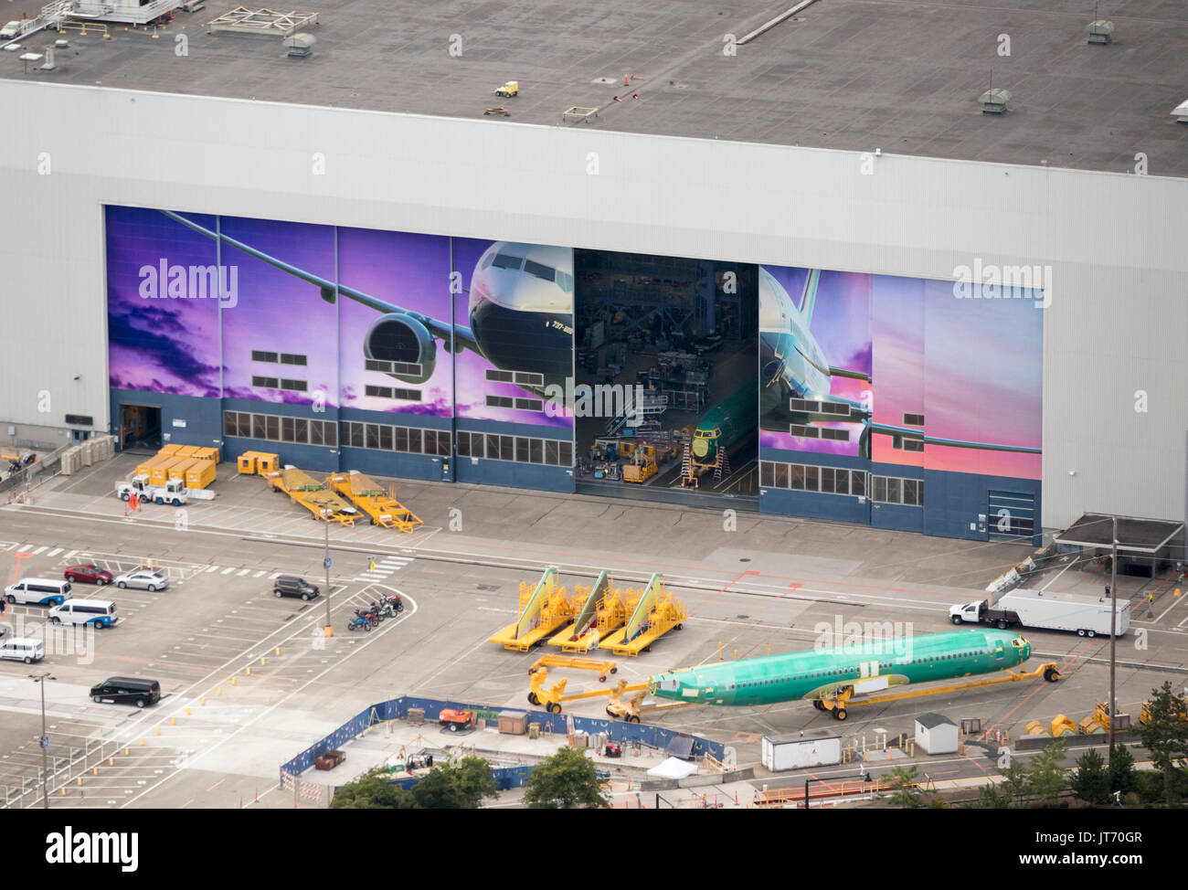 aerial view of 737 MAX JetAirlines planes under construction in hanger ...