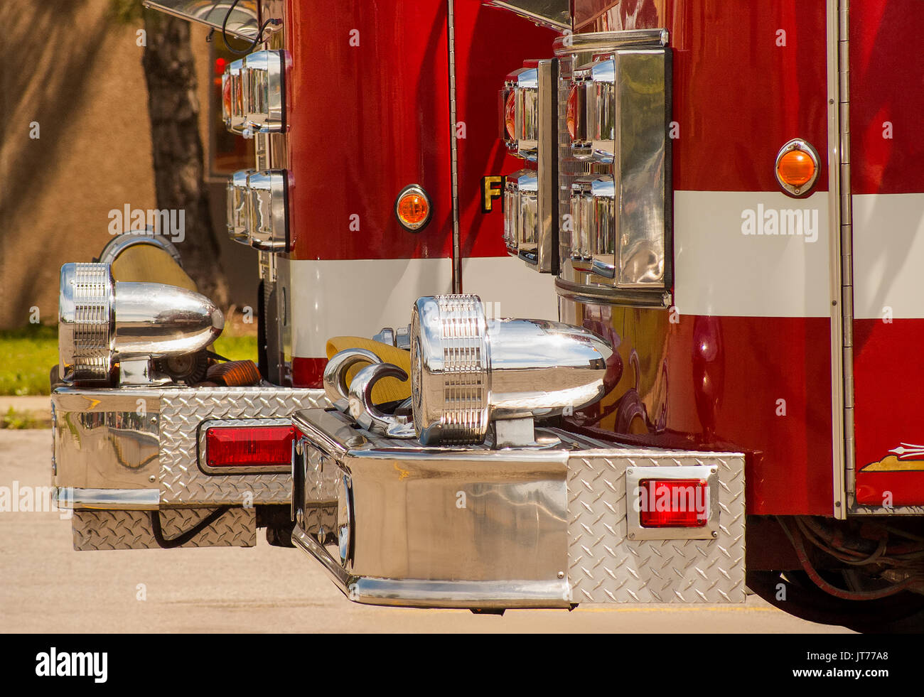 Local fire department red engines on stand by Stock Photo - Alamy