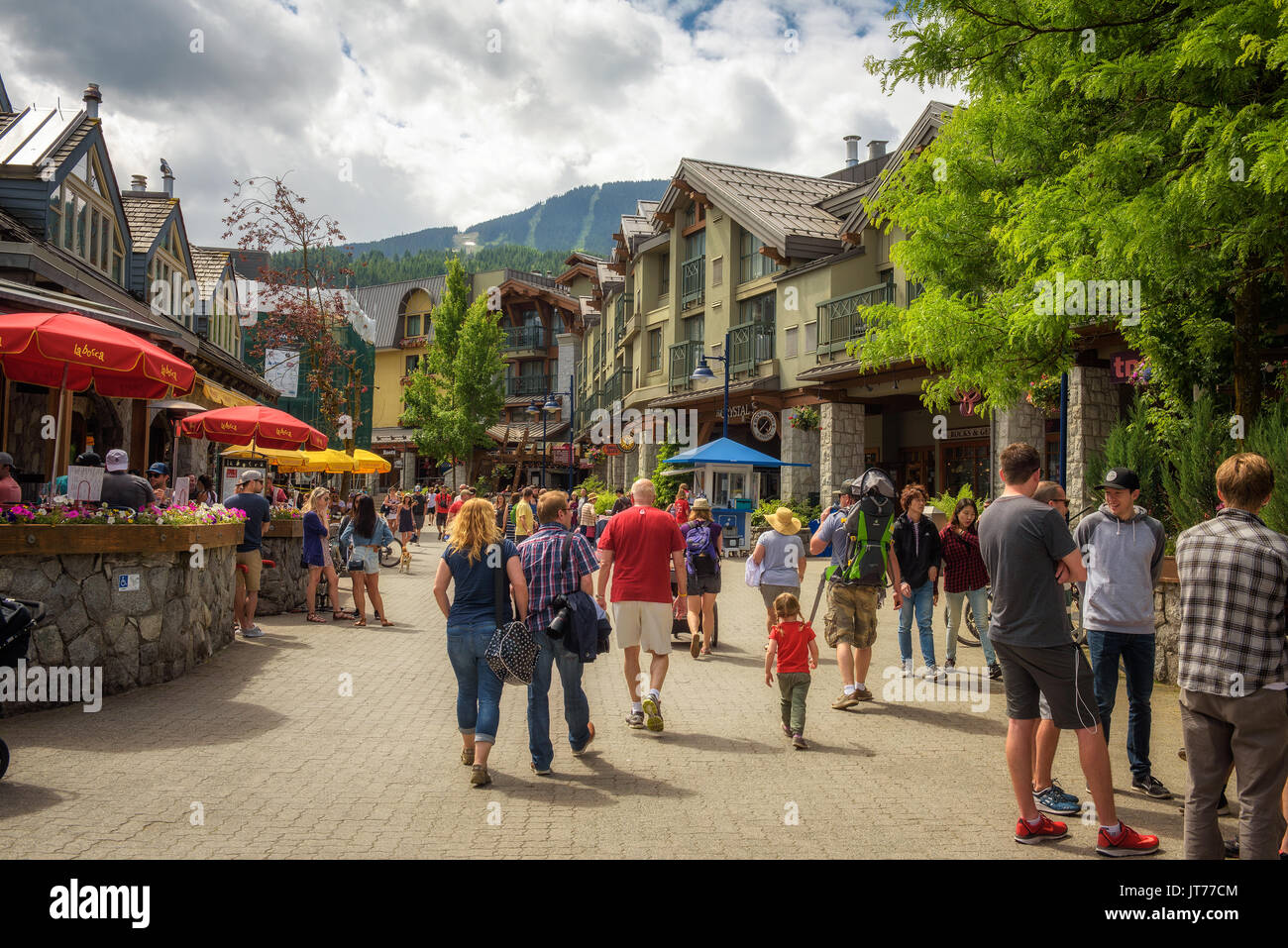Scenic street view with many tourists in Whistler Village Stock Photo ...