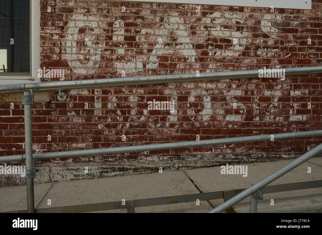 vintage painted sign on old brick building Stock Photo - Alamy