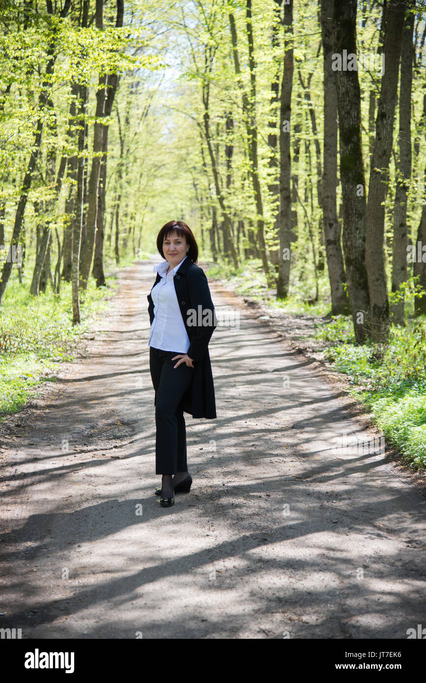 Cute woman on the walk Stock Photo - Alamy