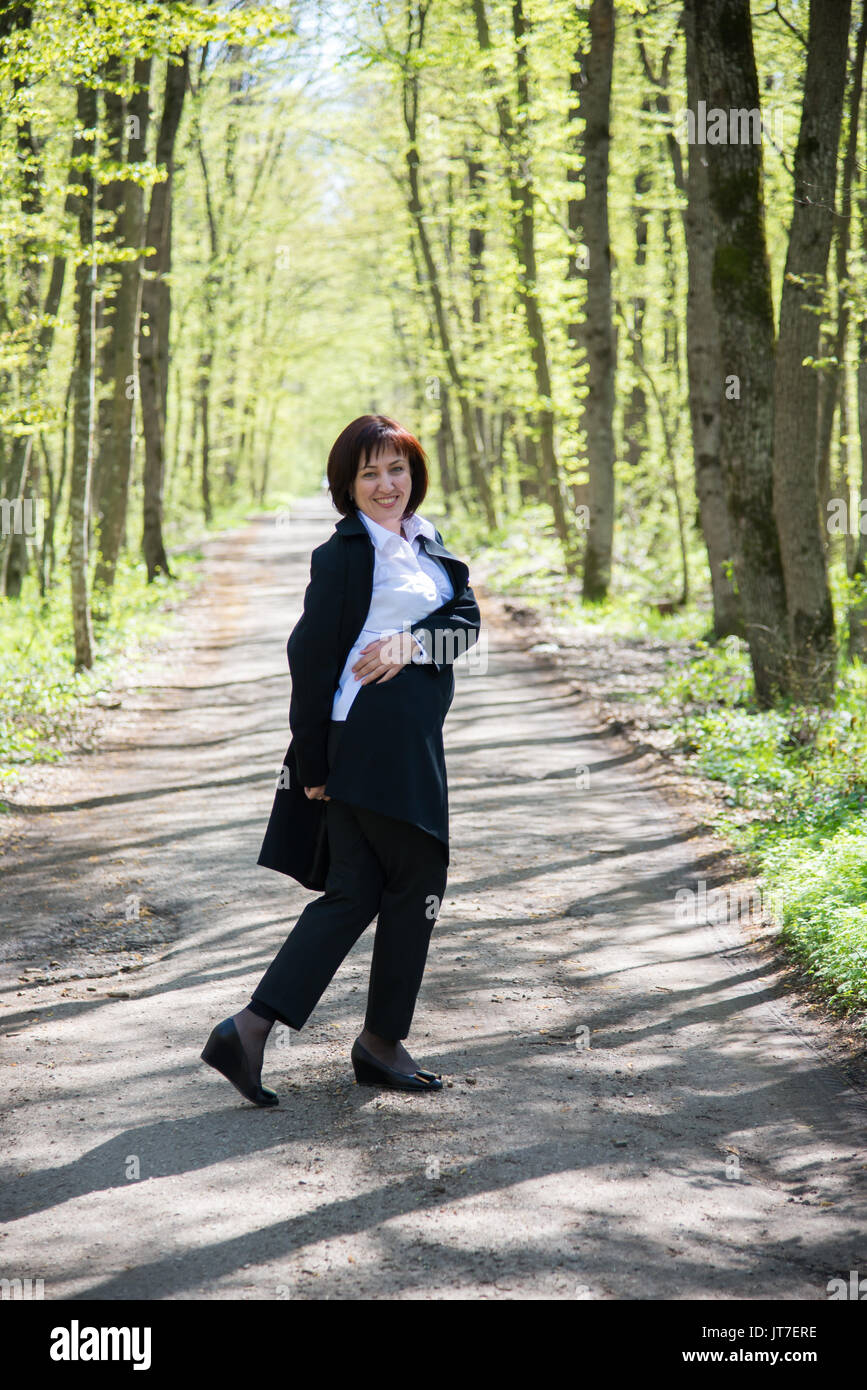 Cute woman on the walk Stock Photo - Alamy
