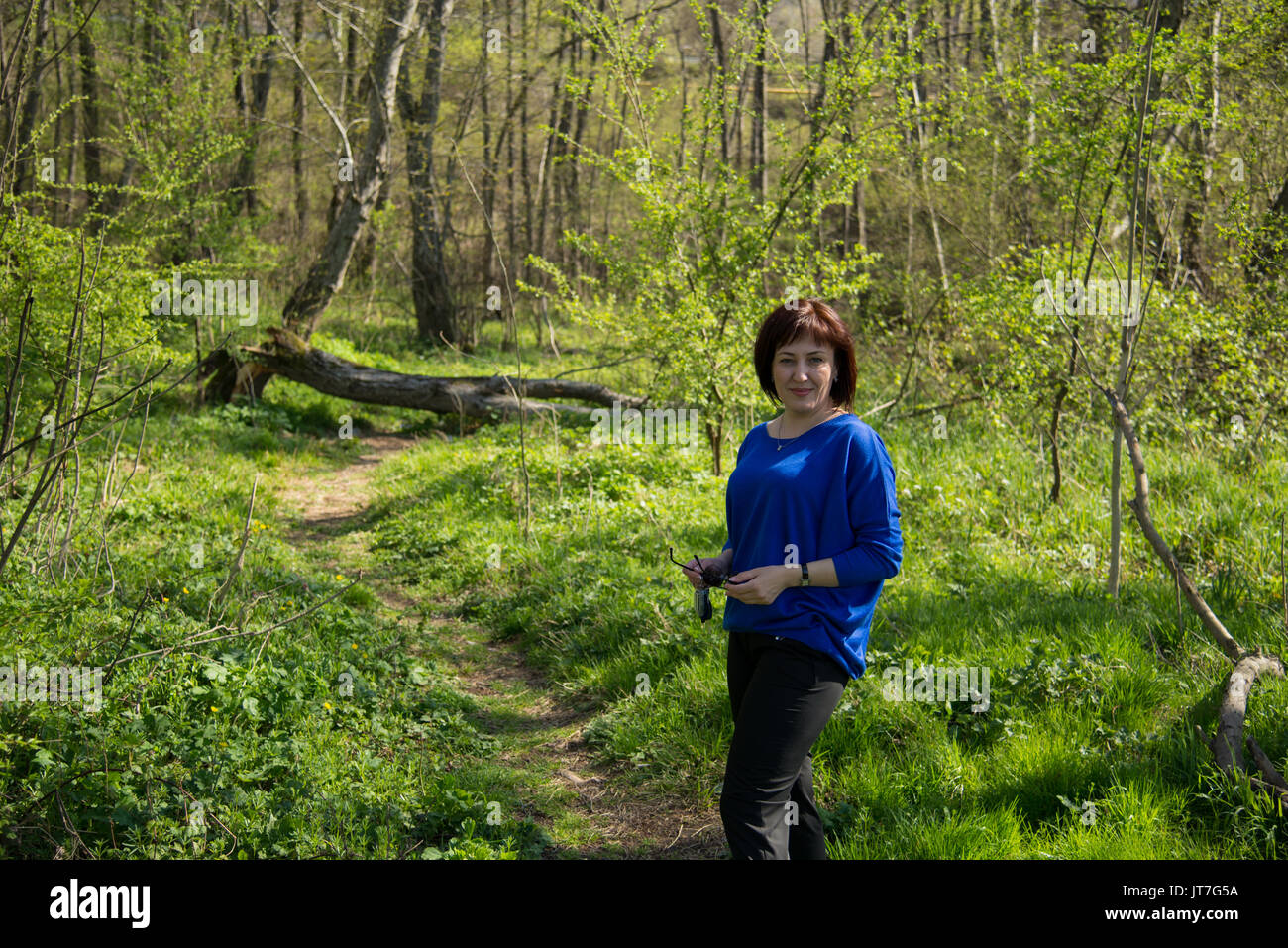 Cute woman on the walk Stock Photo - Alamy