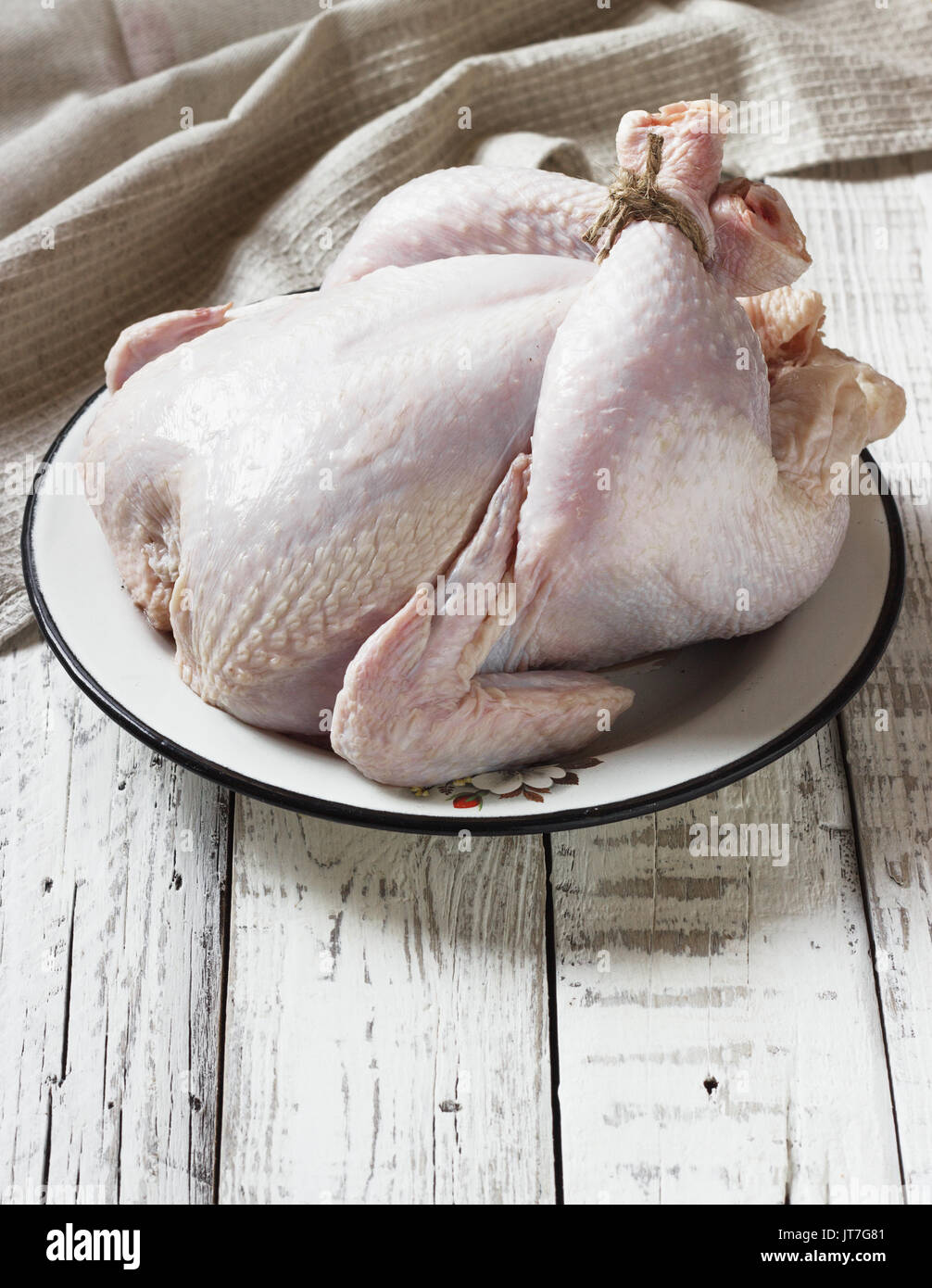 chicken carcass is not cooked on a white wooden background Stock Photo ...