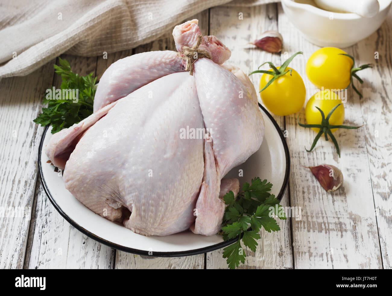 chicken carcass is not cooked on a white wooden background Stock Photo ...