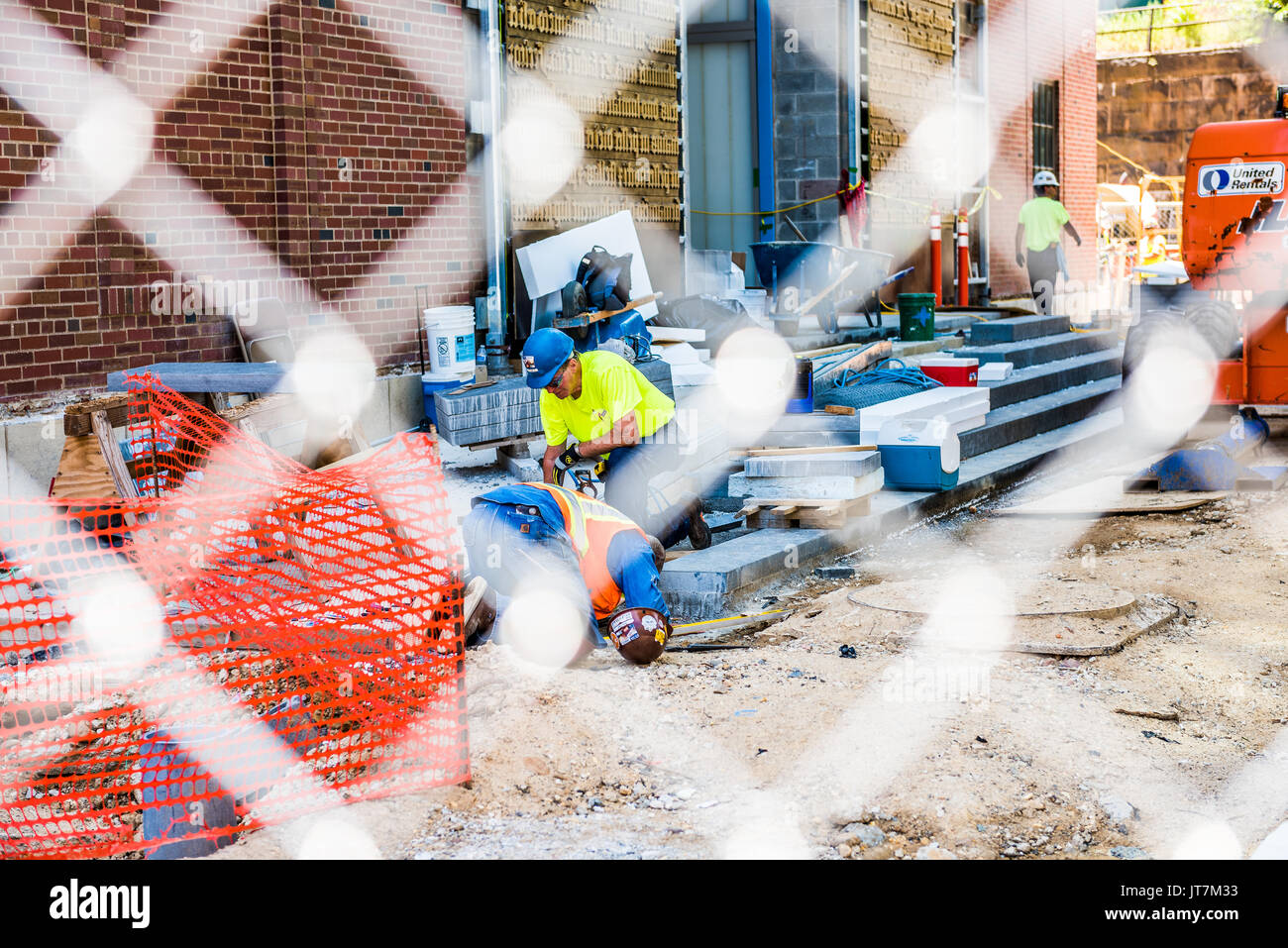 Construction equipment behind fence hi-res stock photography and images ...