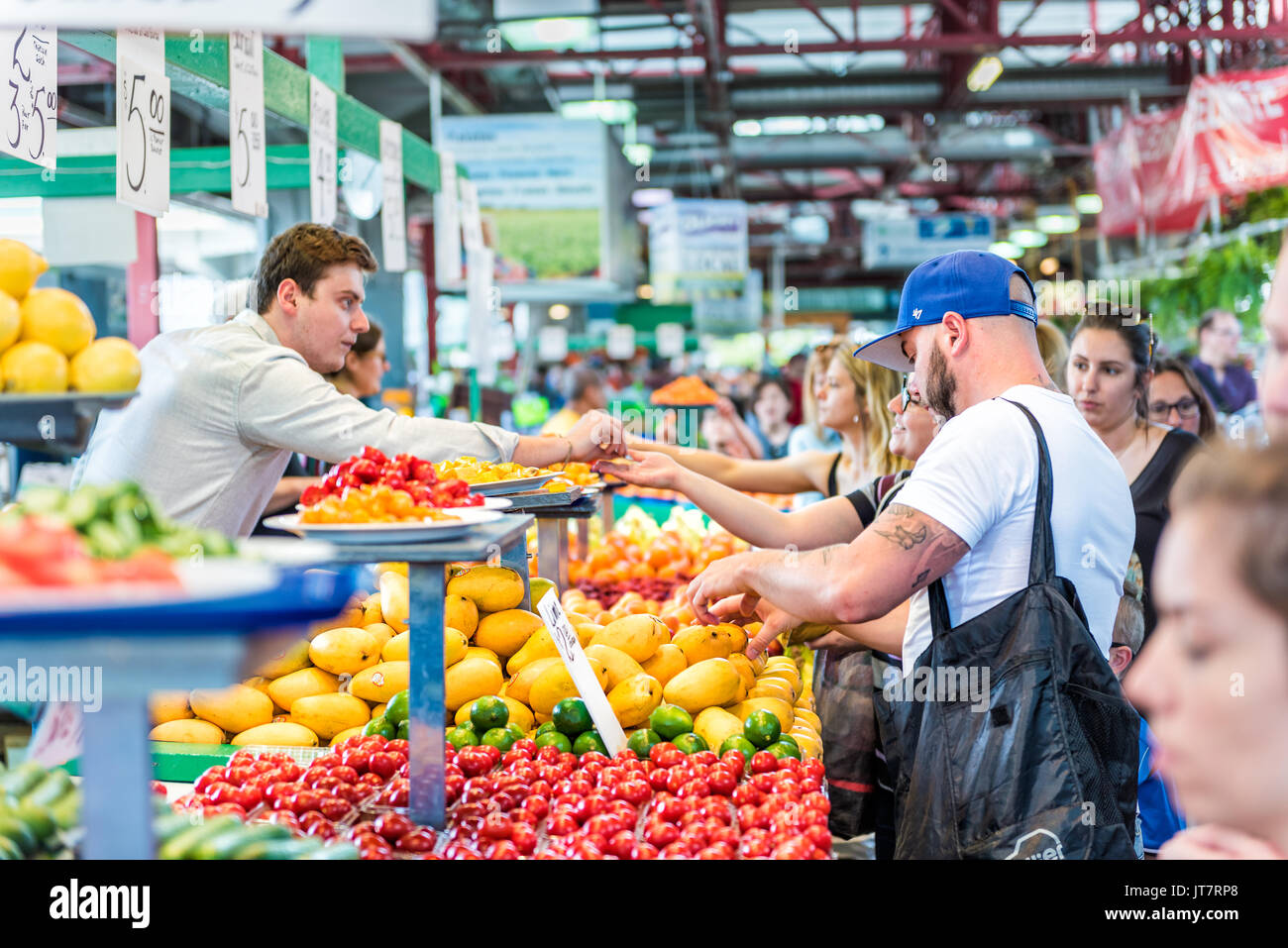 Buying fruit money hi-res stock photography and images - Alamy