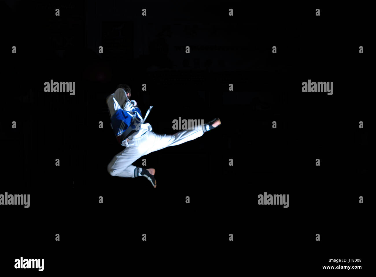 Taekwondo side jumping kick hi-res stock photography and images - Alamy