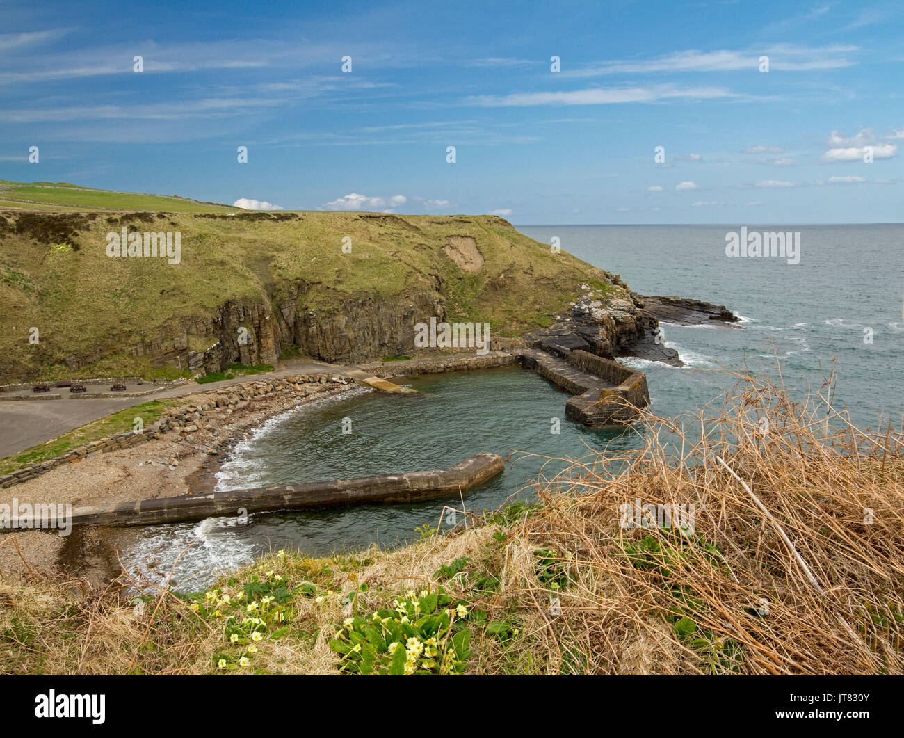 Coastal landscape with sheltered harbour and beach at Latheronwheel at ...
