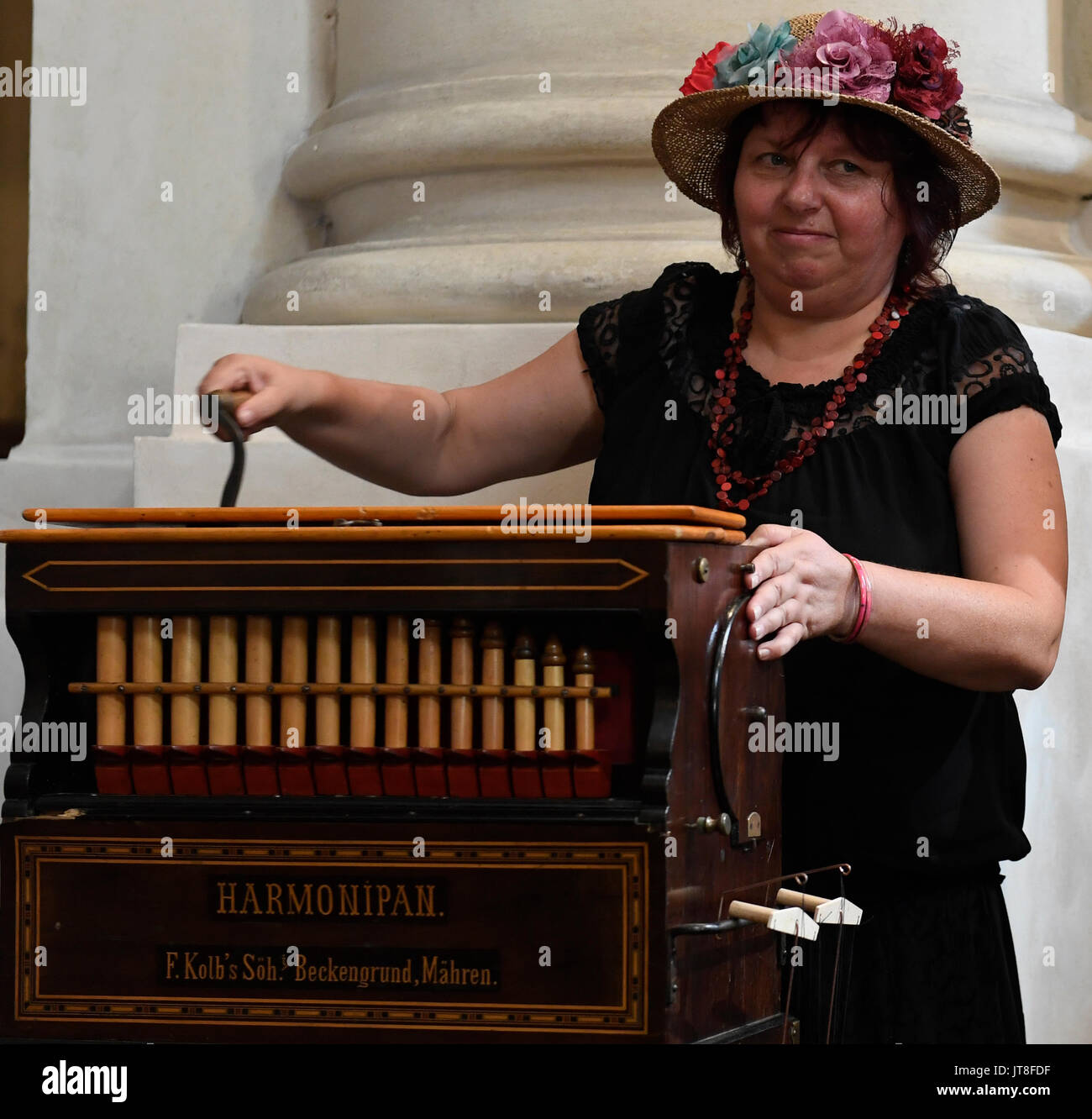 Prague, Czech Republic. 08th Aug, 2017. Barrel organ player attends the ...