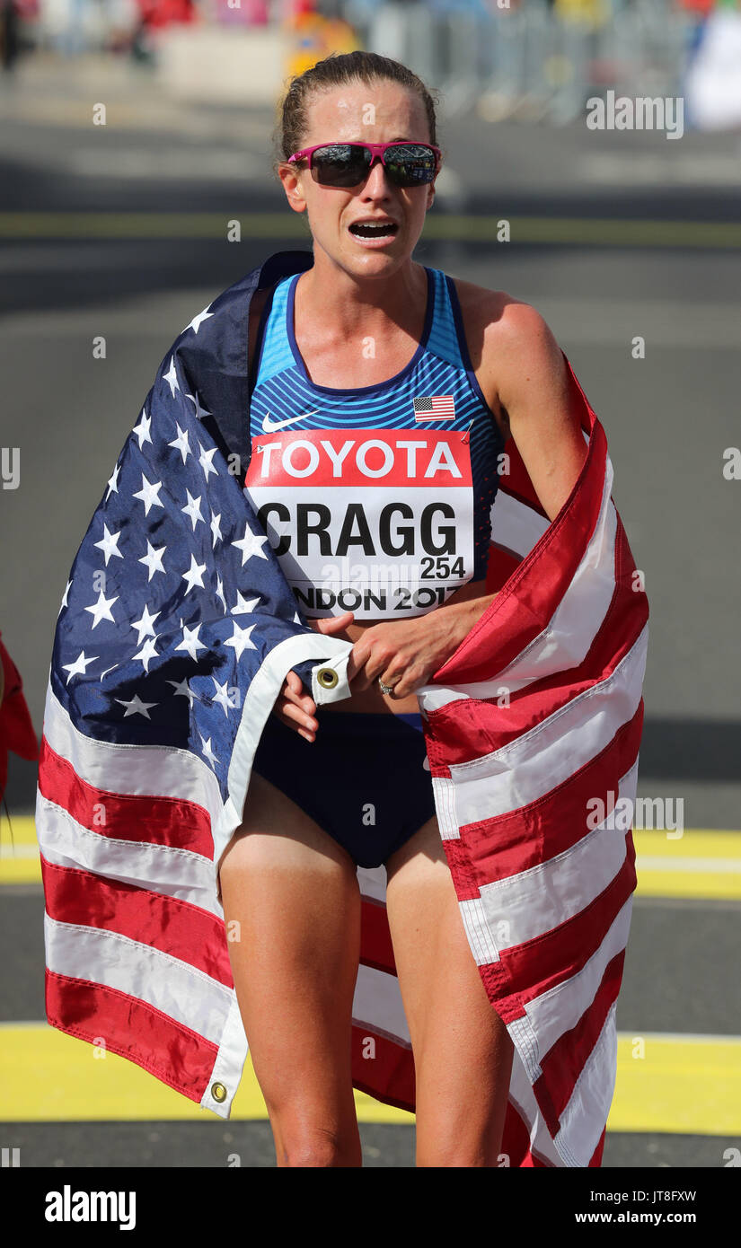 Amy Cragg (USA) poses with United States flag after placing third in ...