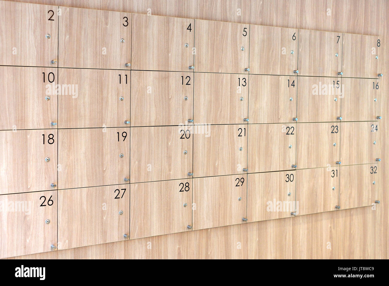 wooden locker with number in front of box Stock Photo - Alamy