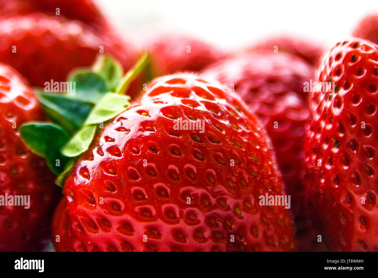 Succulent red strawberries hi-res stock photography and images - Alamy