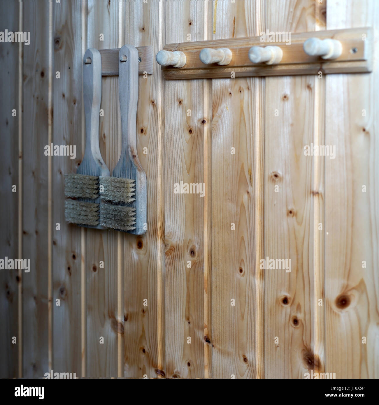 brush hanging on rack in the sauna room Stock Photo - Alamy