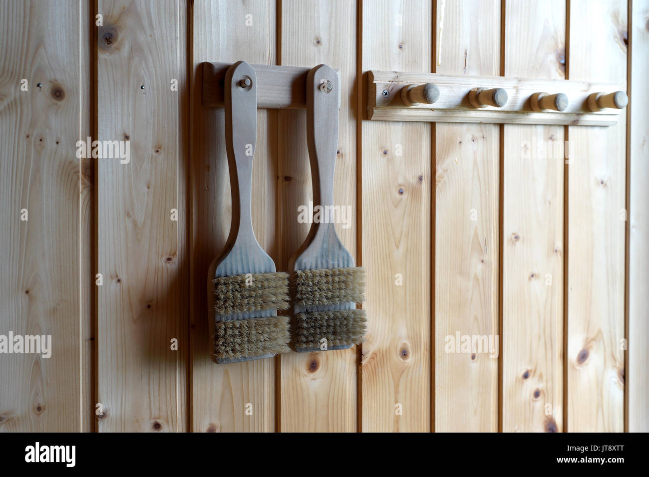 brush hanging on rack in the sauna room Stock Photo - Alamy