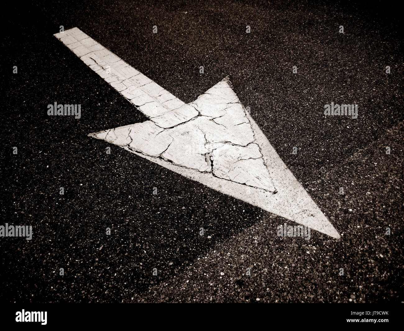 an image of an arrow sign on the road Stock Photo - Alamy