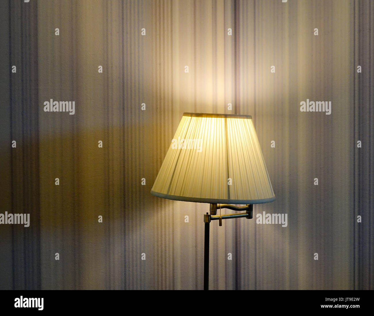 Elegant lamp with yellow light at living room of modern house Stock ...