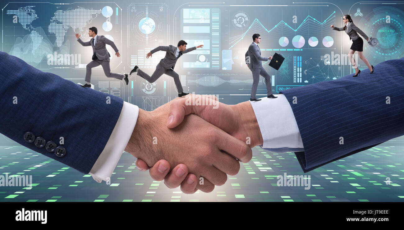 Cooperation concept with people running on handshake Stock Photo - Alamy