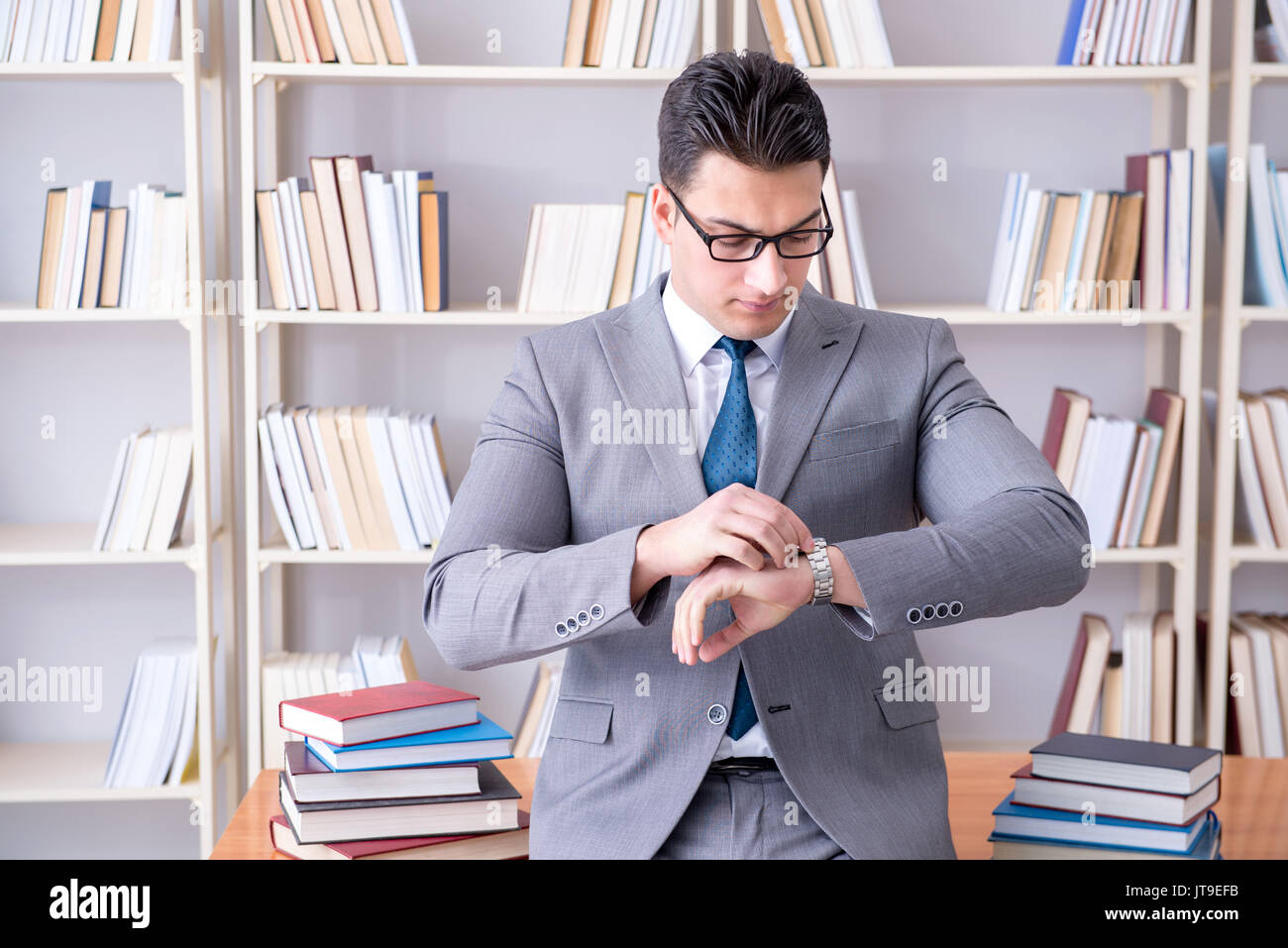 Business law student working studying in the library Stock Photo - Alamy