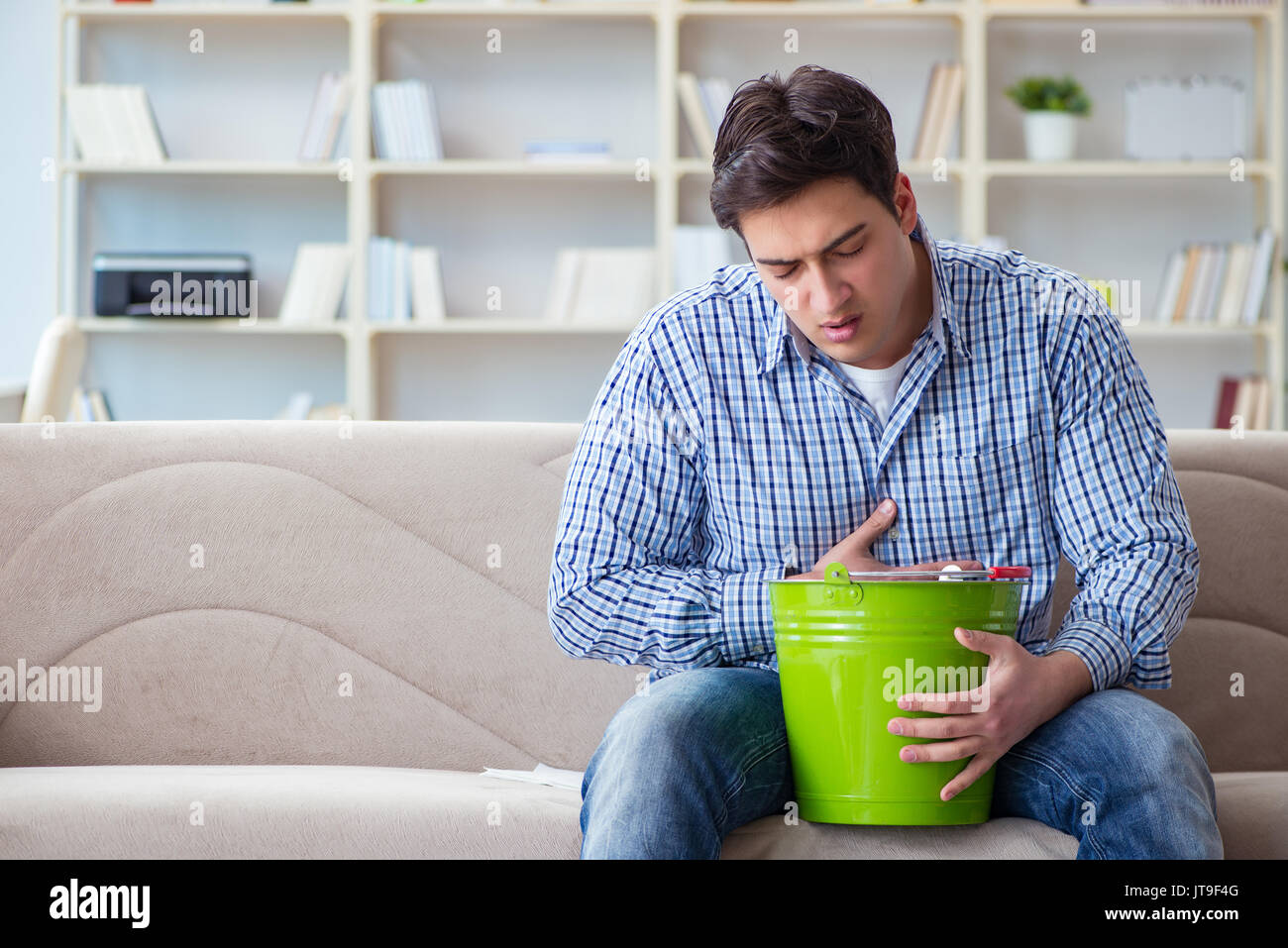 Man suffering from sick stomach and vomiting Stock Photo - Alamy