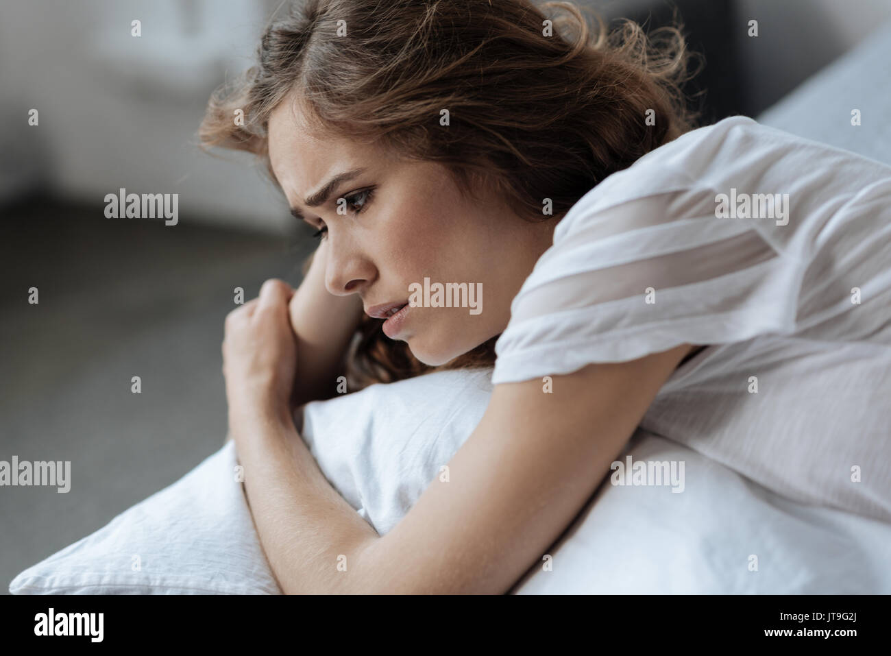 Cheerless sad woman feeling unhappy Stock Photo - Alamy