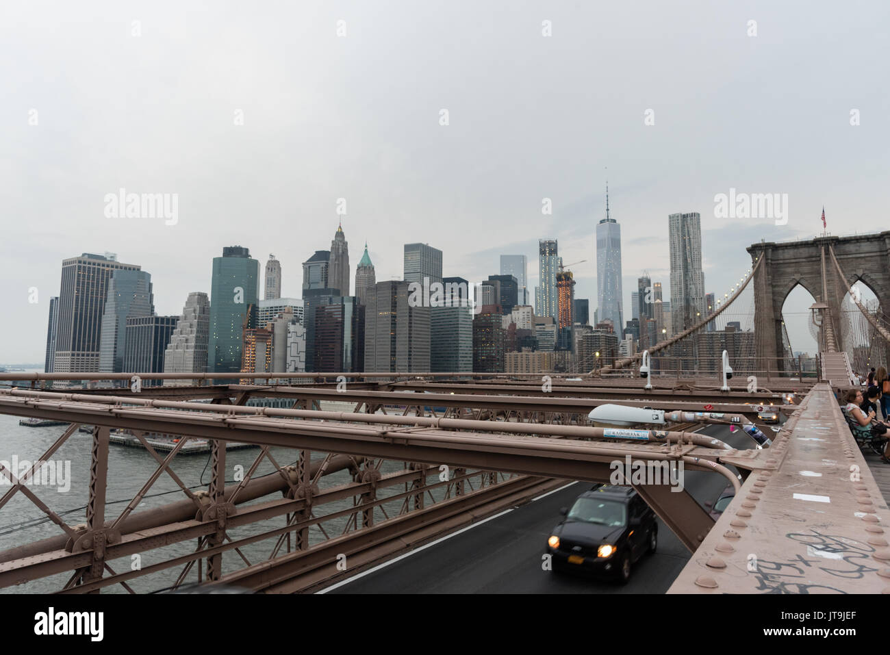 Brooklyn Bridge and lower Manhattan at dusk Stock Photo - Alamy